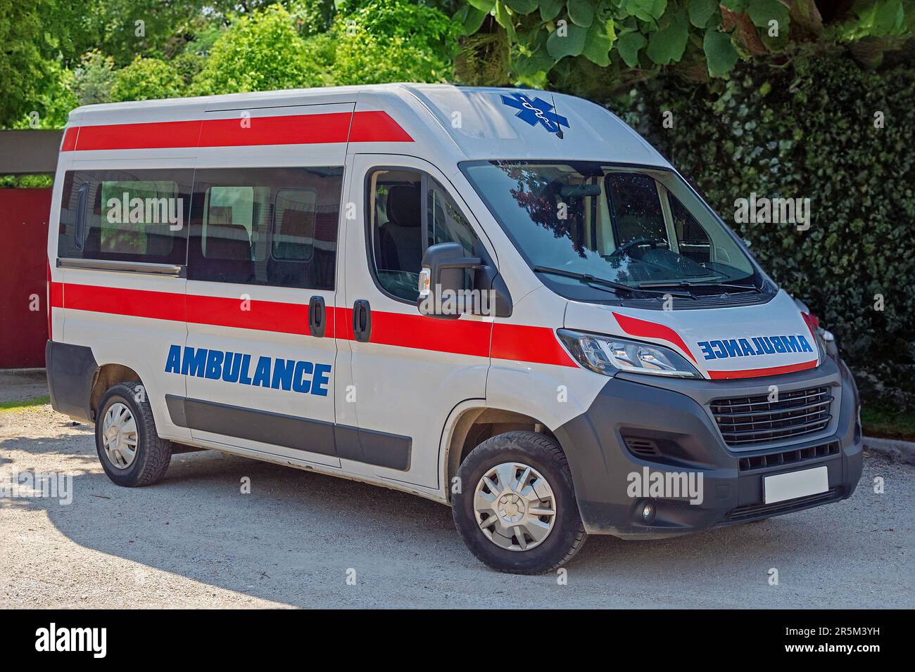 Empty ambulance vehicle parked outside on the street Stock Photo - Alamy
