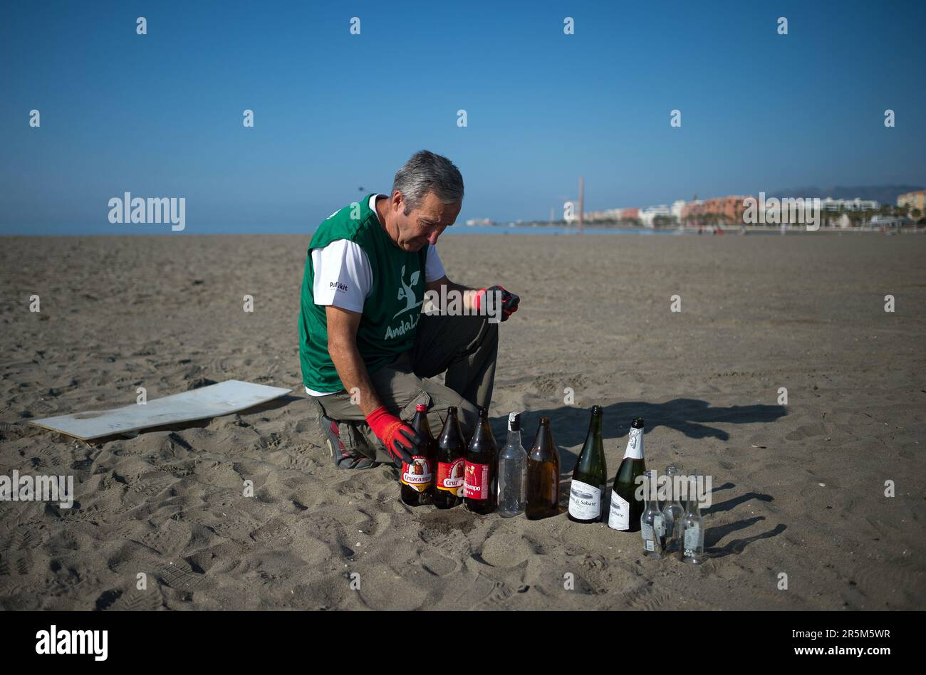 Malaga, Spain. 04th June, 2023. A volunteer is seen stacking bottles ...