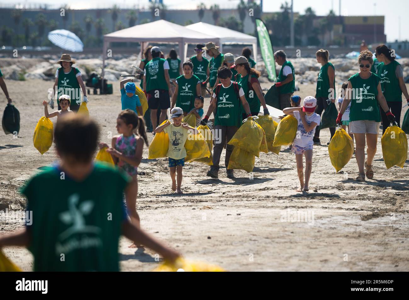Malaga, Spain. 04th June, 2023. A group of volunteers are seen carying ...