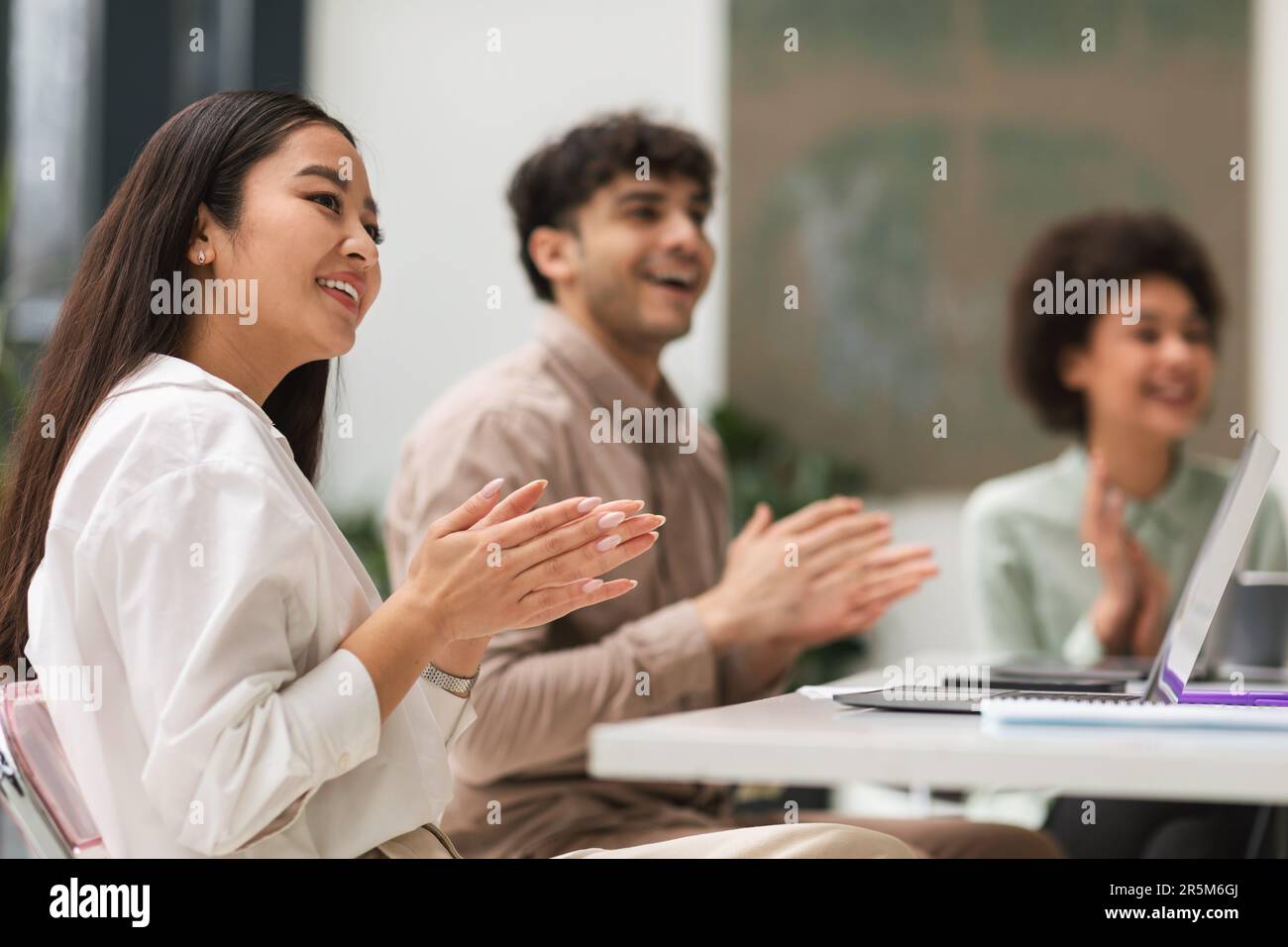 Happy Multicultural Colleagues Clapping Hands Celebrating Achievement ... Happy Multicultural Colleagues Clapping Hands Celebrating Achievement ...