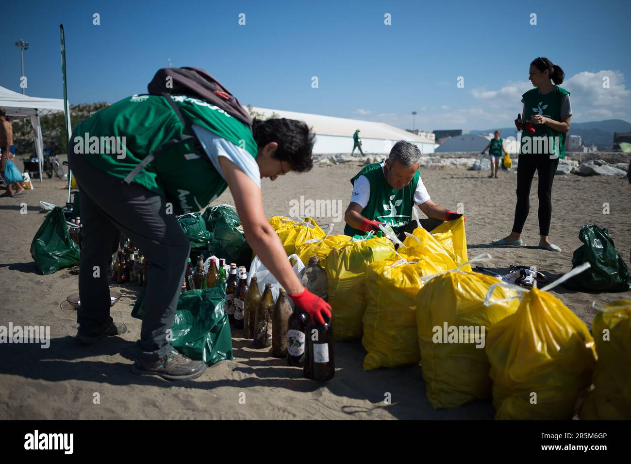 Malaga, Spain. 04th June, 2023. A group of volunteers are seen stacking ...
