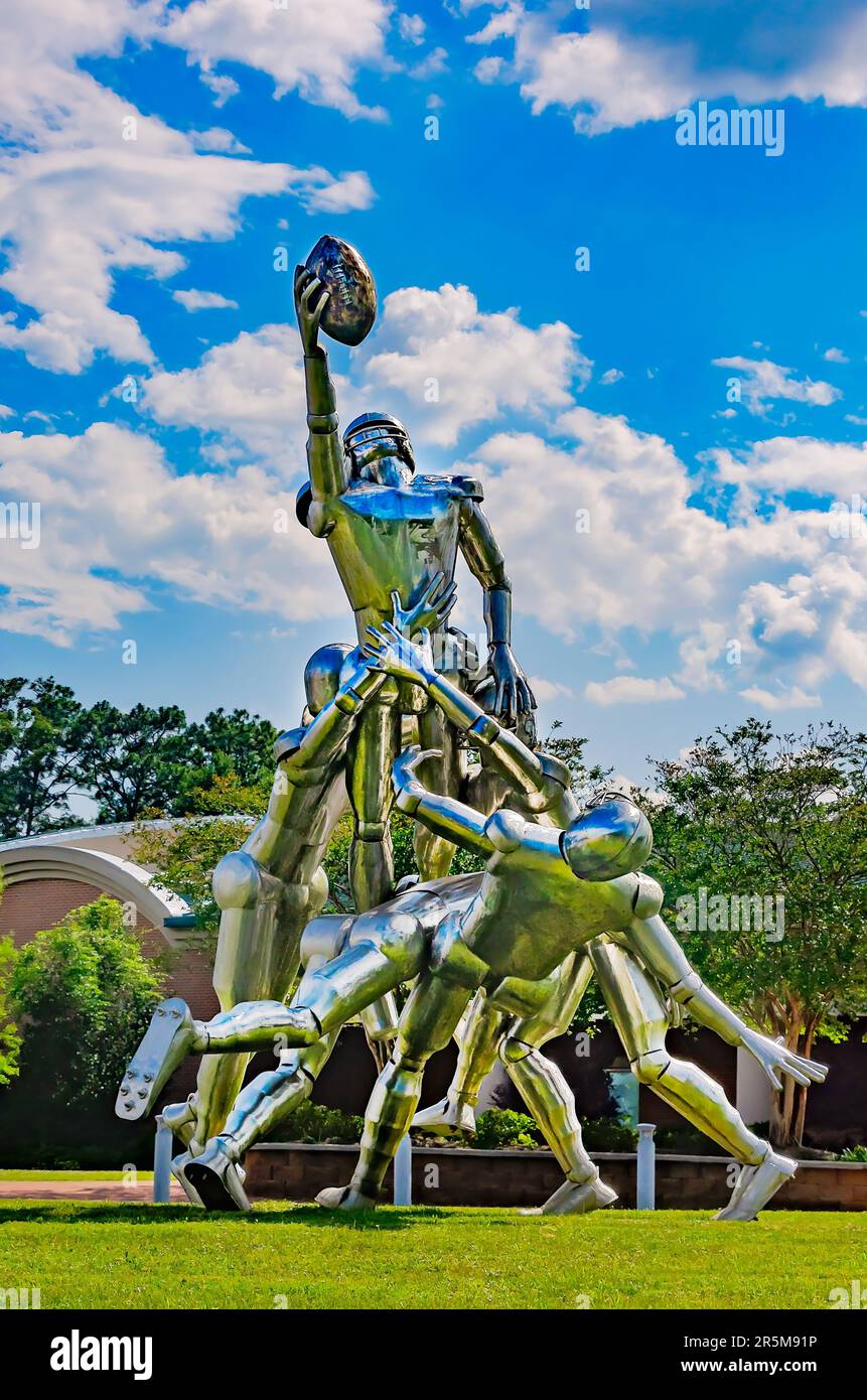 “Gridiron,” a stainless steel sculpture by Bruce Larsen, stands in ...