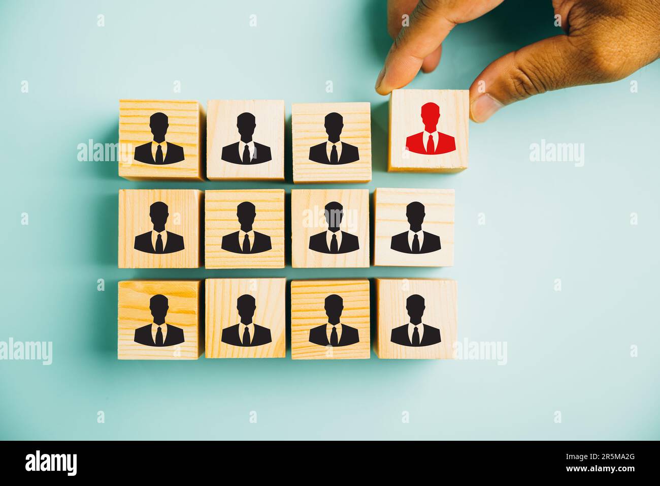 A red manager icon that stands out distinctively from a group of staff ...