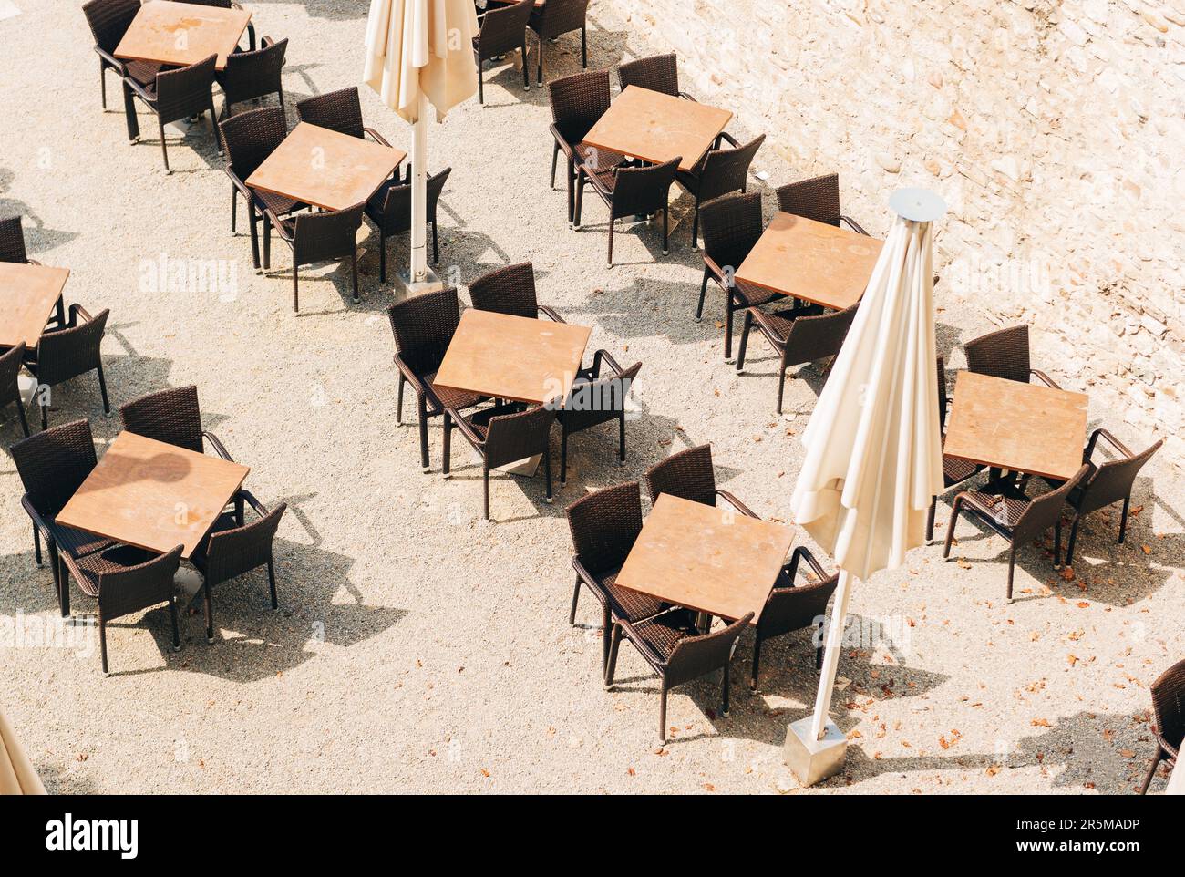 Outdoor cafe with many tables, top view Stock Photo - Alamy