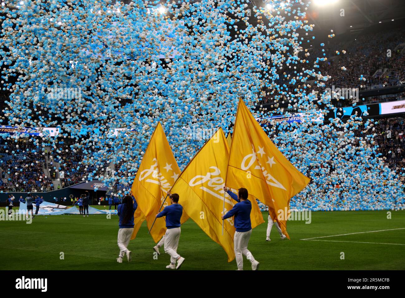 A support group with flags of the Zenit football club during the fall ...
