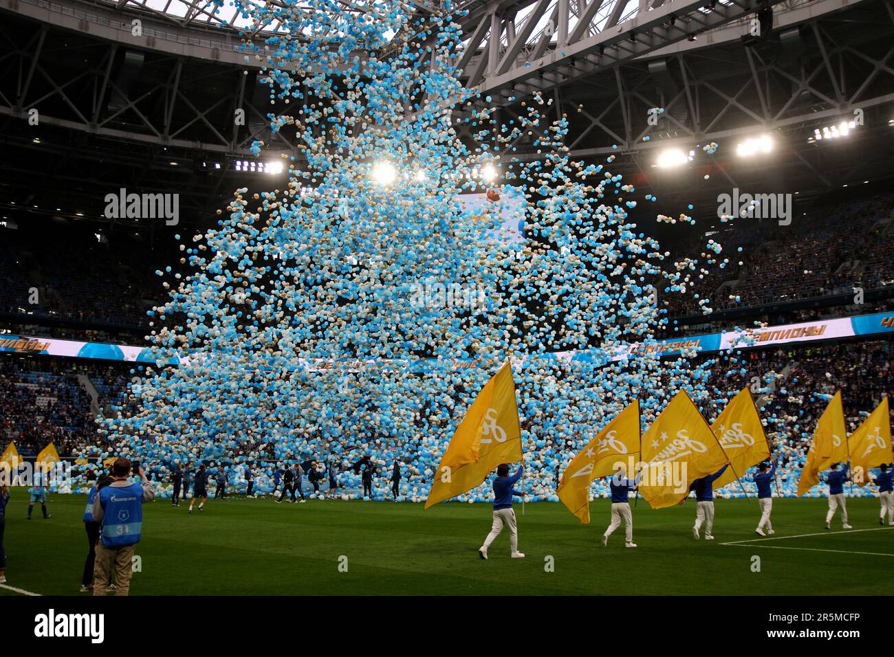 A support group with flags of the Zenit football club during the fall ...