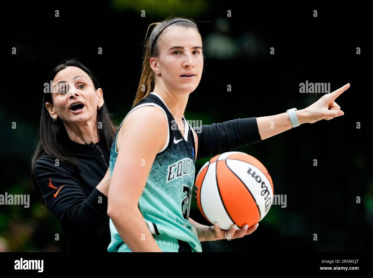 New York Liberty guard Sabrina Ionescu (20) holds the ball as head ...