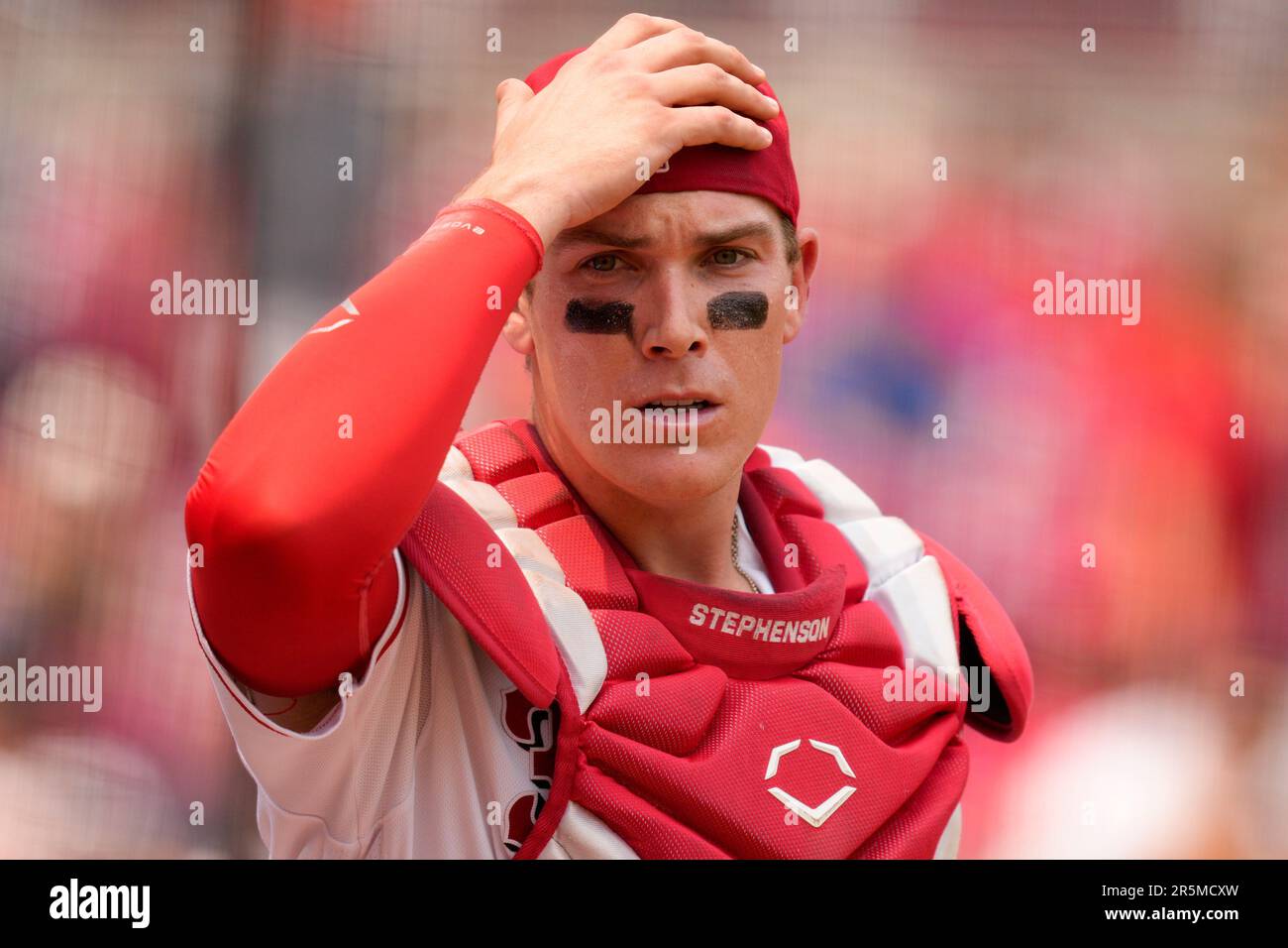 Cincinnati Reds catcher Tyler Stephenson looks to the dugout after ...