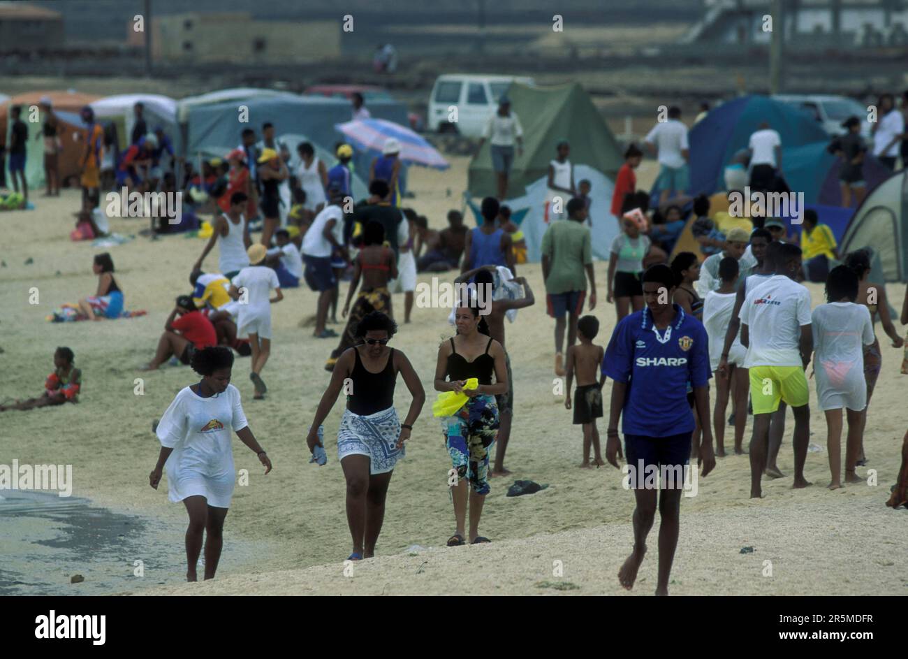 People on a sunday at a Beach in the Landscape on the Island of Sao ...