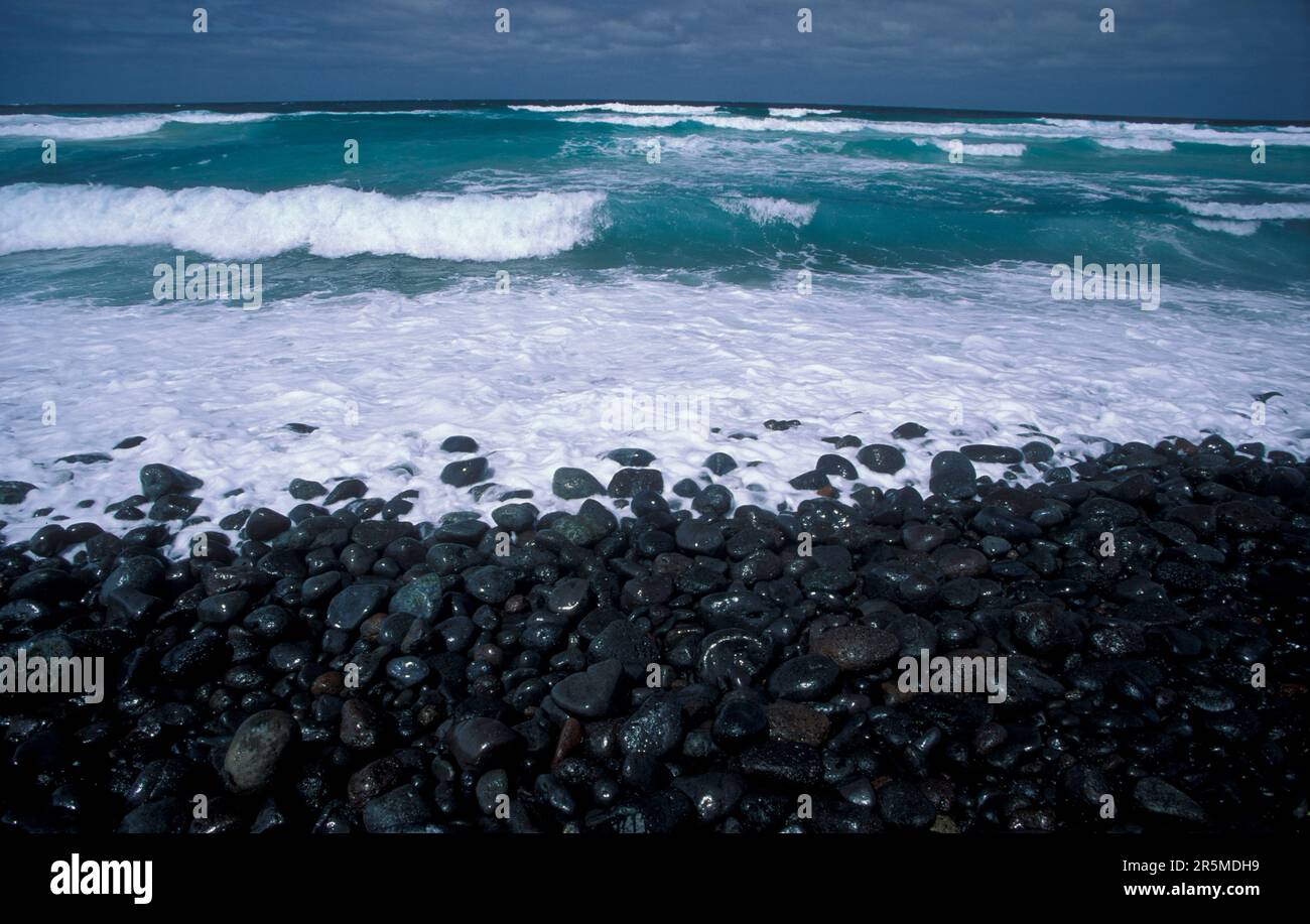the black sand beach of volcanic lava sand at the town of Sao Filipe on ...