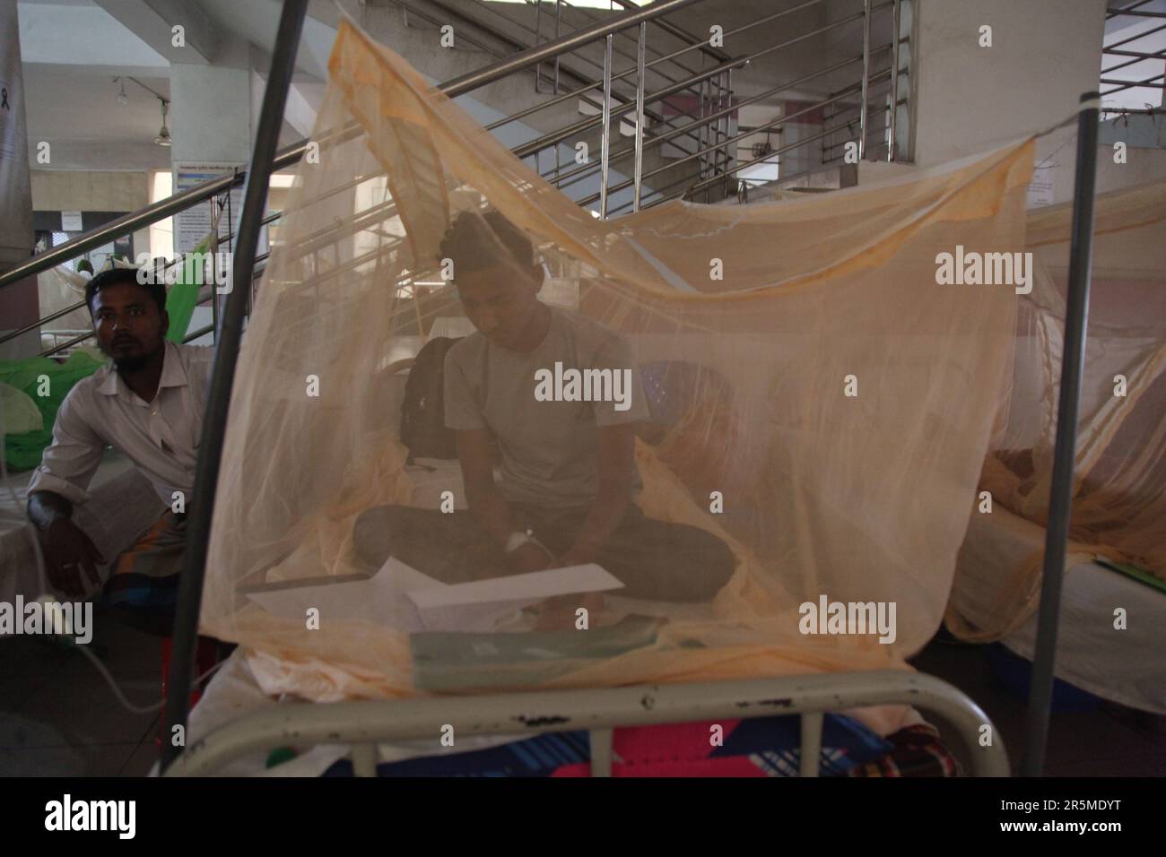 Dengue fever patients lying on the floor and on the bed outside the ...