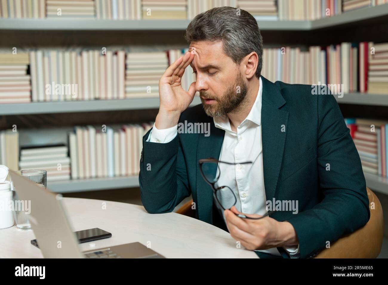 Head pain medicines pills concept. Cephalalgia and migraine. Man with ...