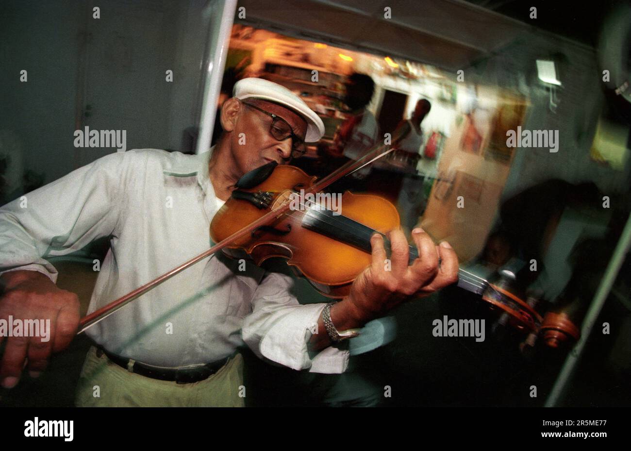 Musicien play traditional Morna or Cape Verde Fado in a Restaurant in ...