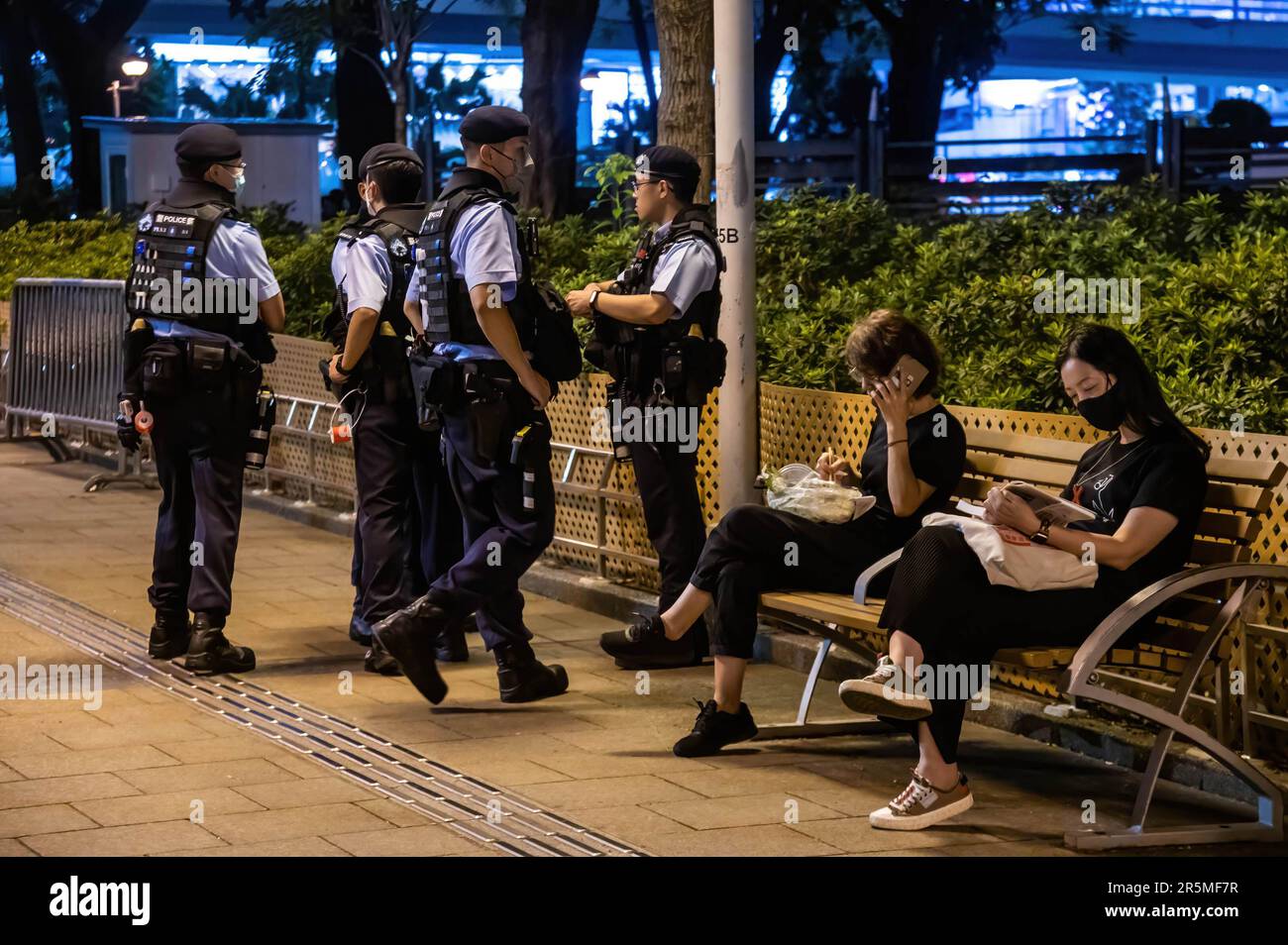 Hong Kong, China. 04th June, 2023. A woman reads "May 35th" on a bench ...