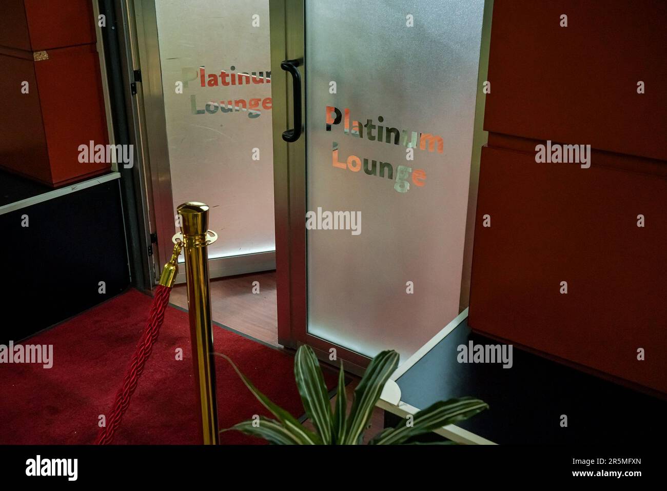 Half opened door with frosted glass leading to lounge at airport Stock ...