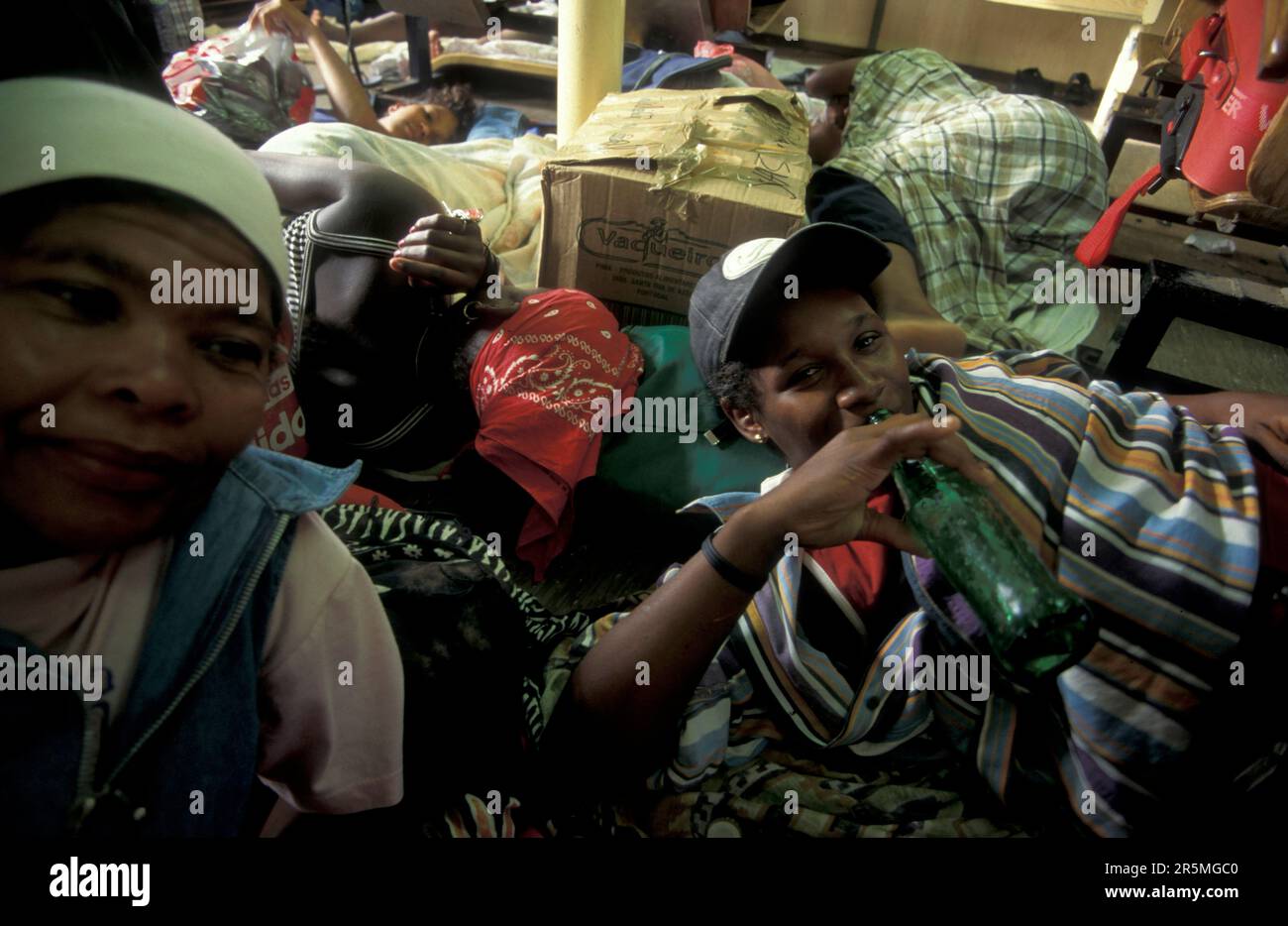 People relax on a long trip on a Ferry Ship from City Mindelo to the ...