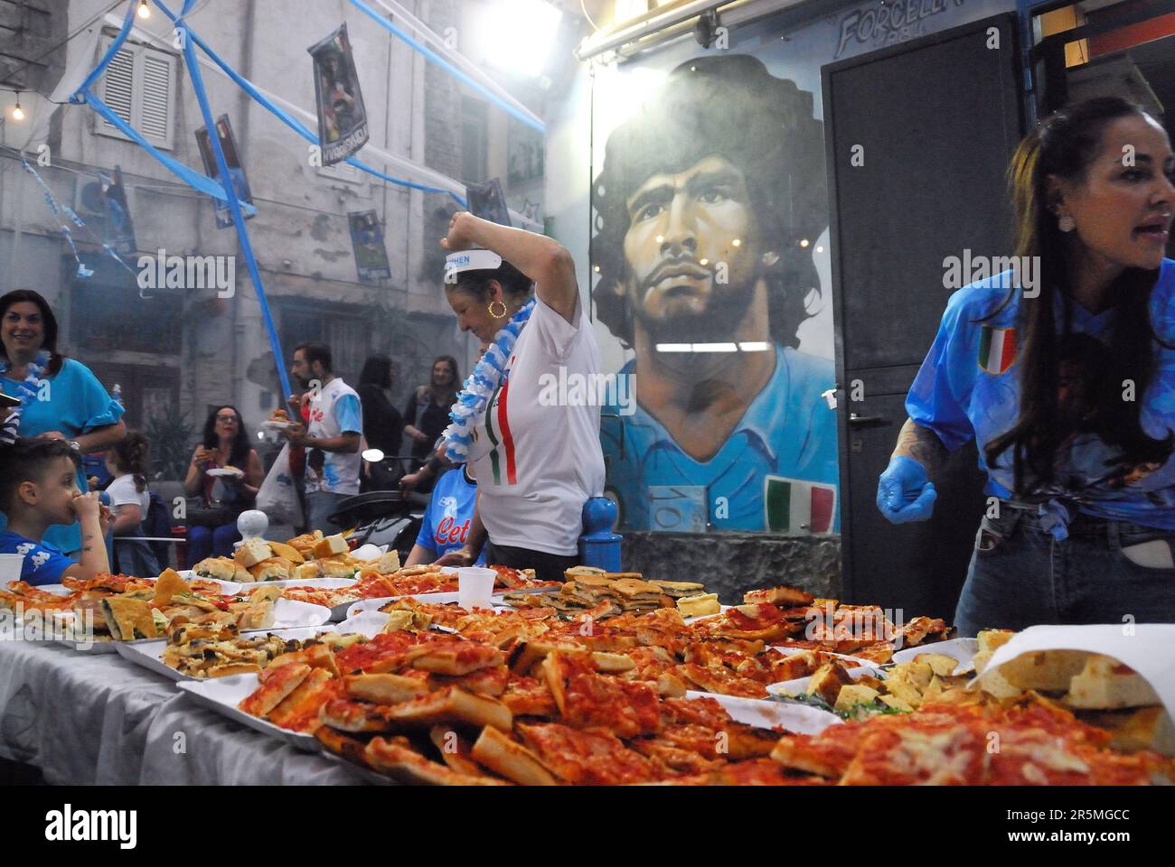 Naples, Italy, June 4th, 2023. Forcella neighborhood. People wearing ...