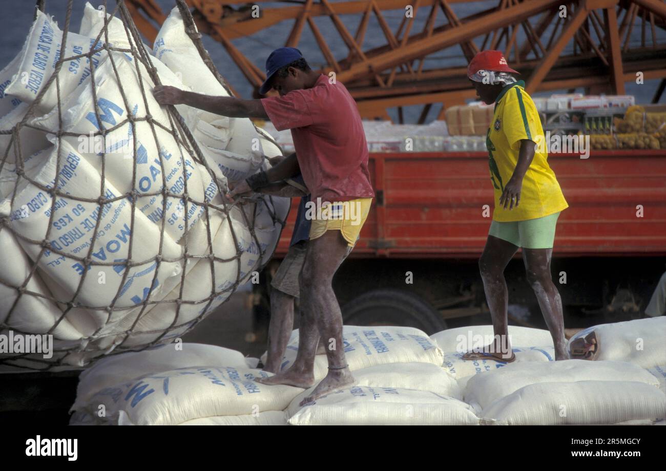 workers at the ship Pier terminal at the Ship Port of the city Praia on ...