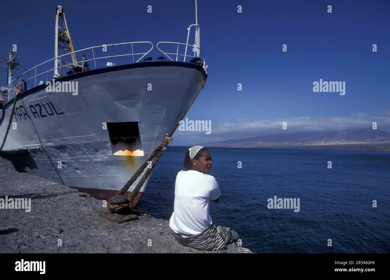 workers at the ship Pier terminal at the Ship Port of the city Praia on ...
