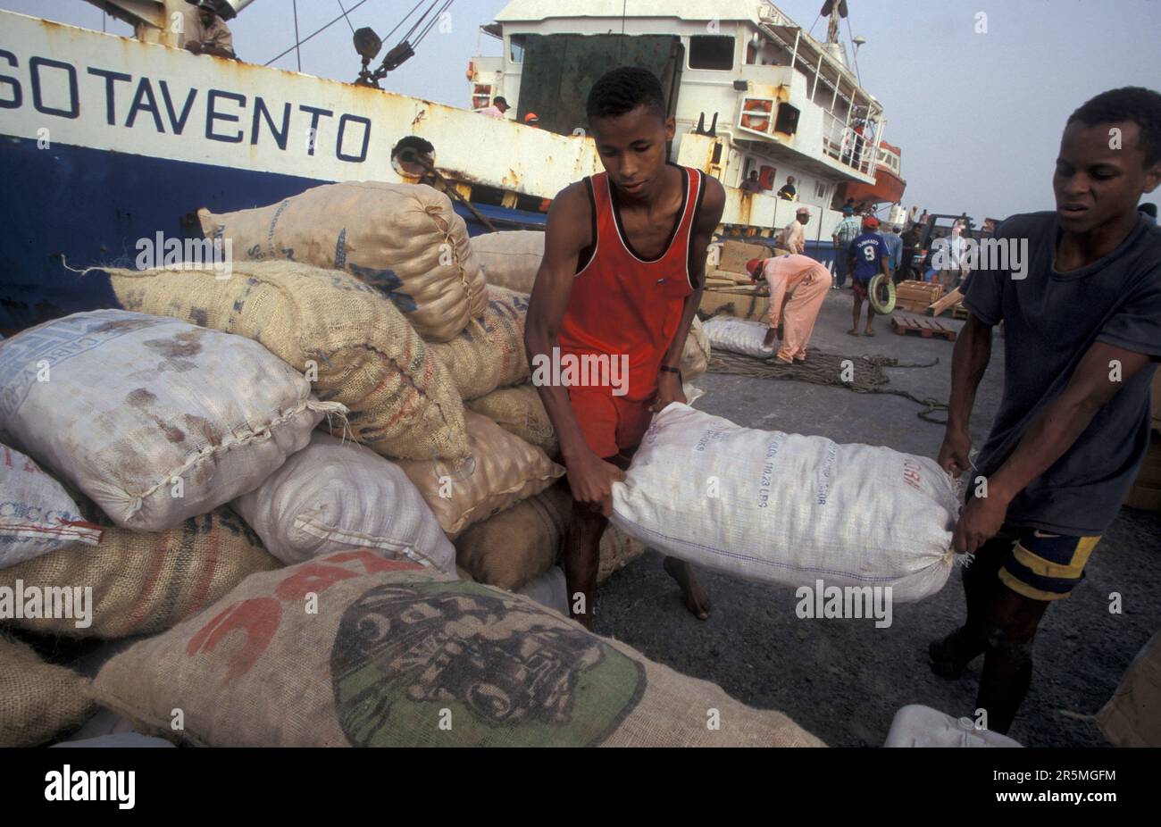 workers at the ship Pier terminal at the Ship Port of the city Praia on ...