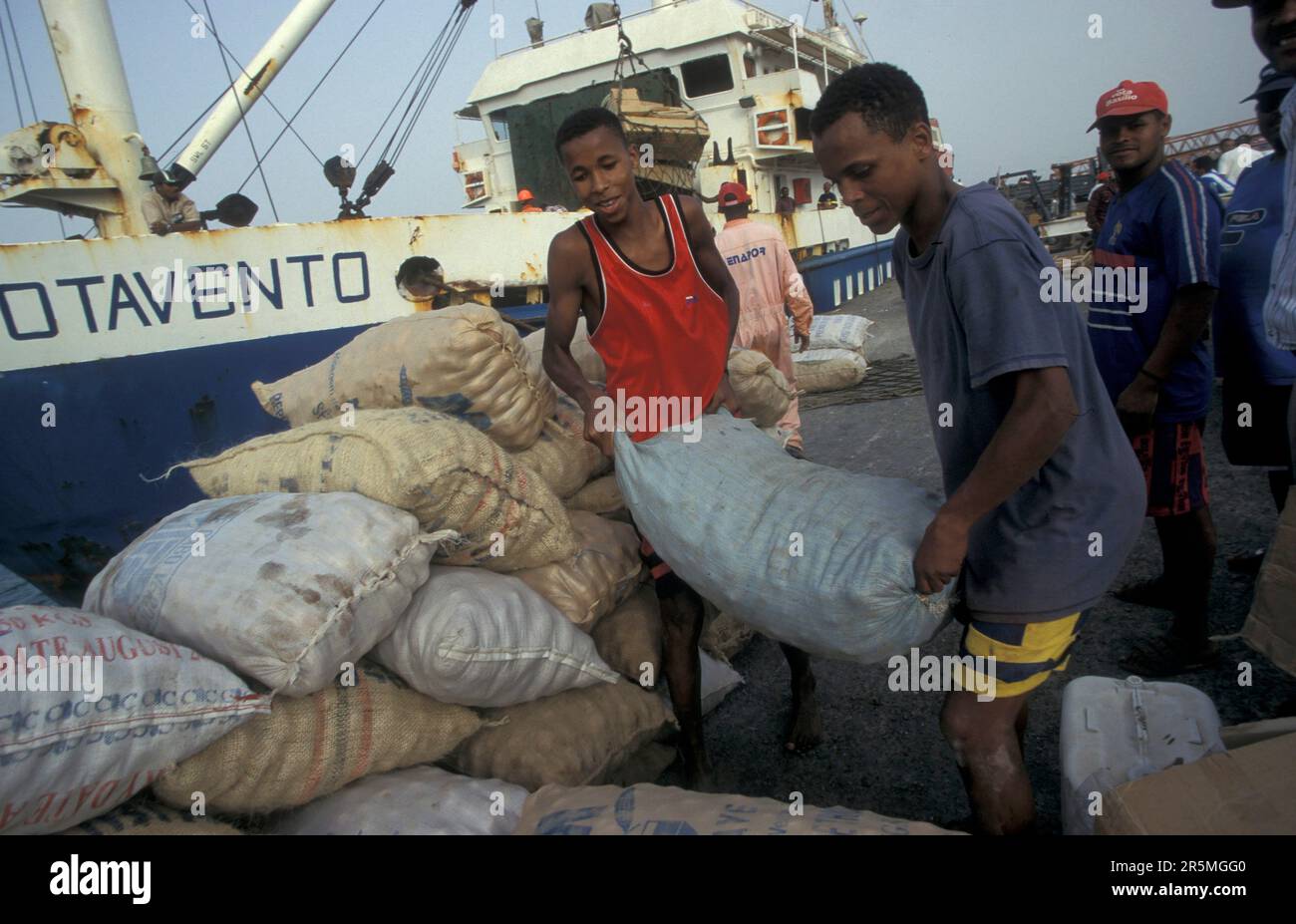 workers at the ship Pier terminal at the Ship Port of the city Praia on ...