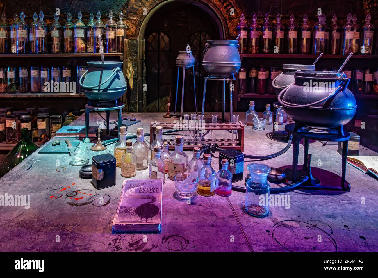 Potion making equipment on a desk in the potions lab set at Hogwarts ...