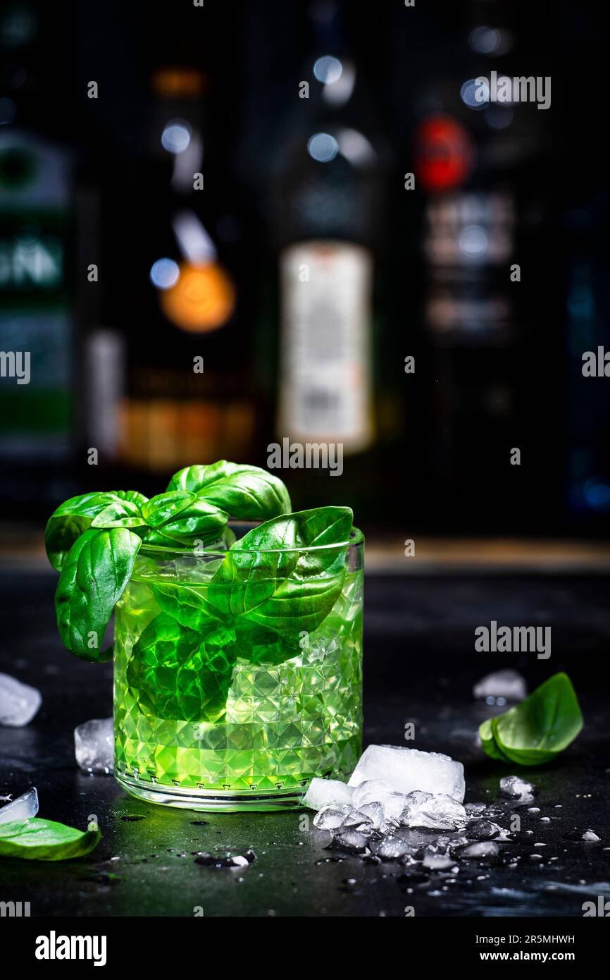 Basil smash alcoholic cocktail drink with dry gin, syrup, lemon, basil ...