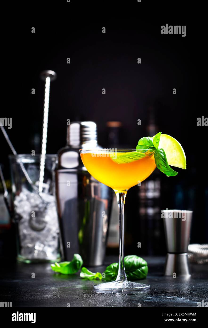 Spring grass alcoholic cocktail drink with whiskey, apple liqueur ...