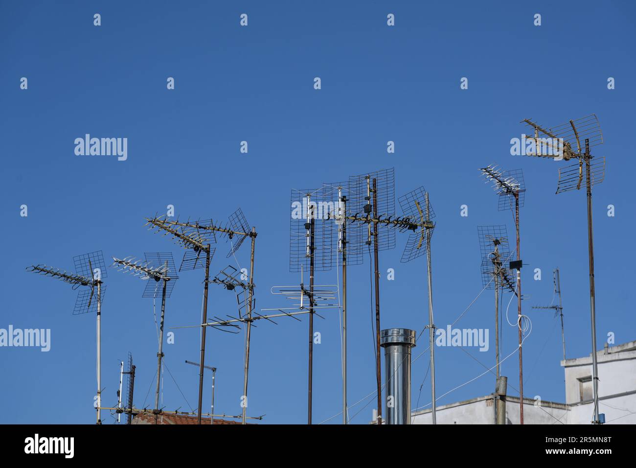 Various antennas on the roof of a residential apartment building for ...