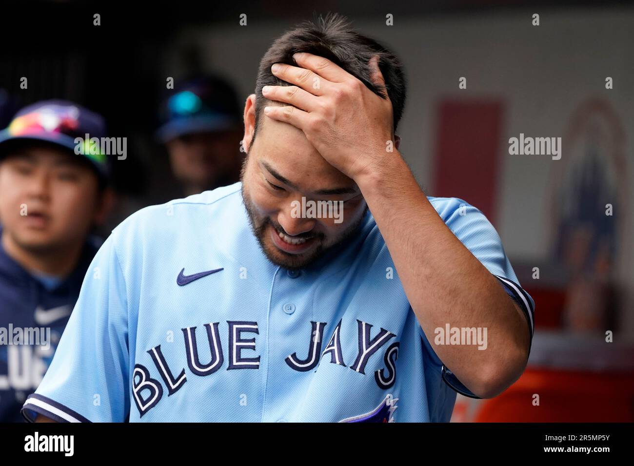 Toronto Blue Jays starting pitcher Yusei Kikuchi (16) stands in the ...