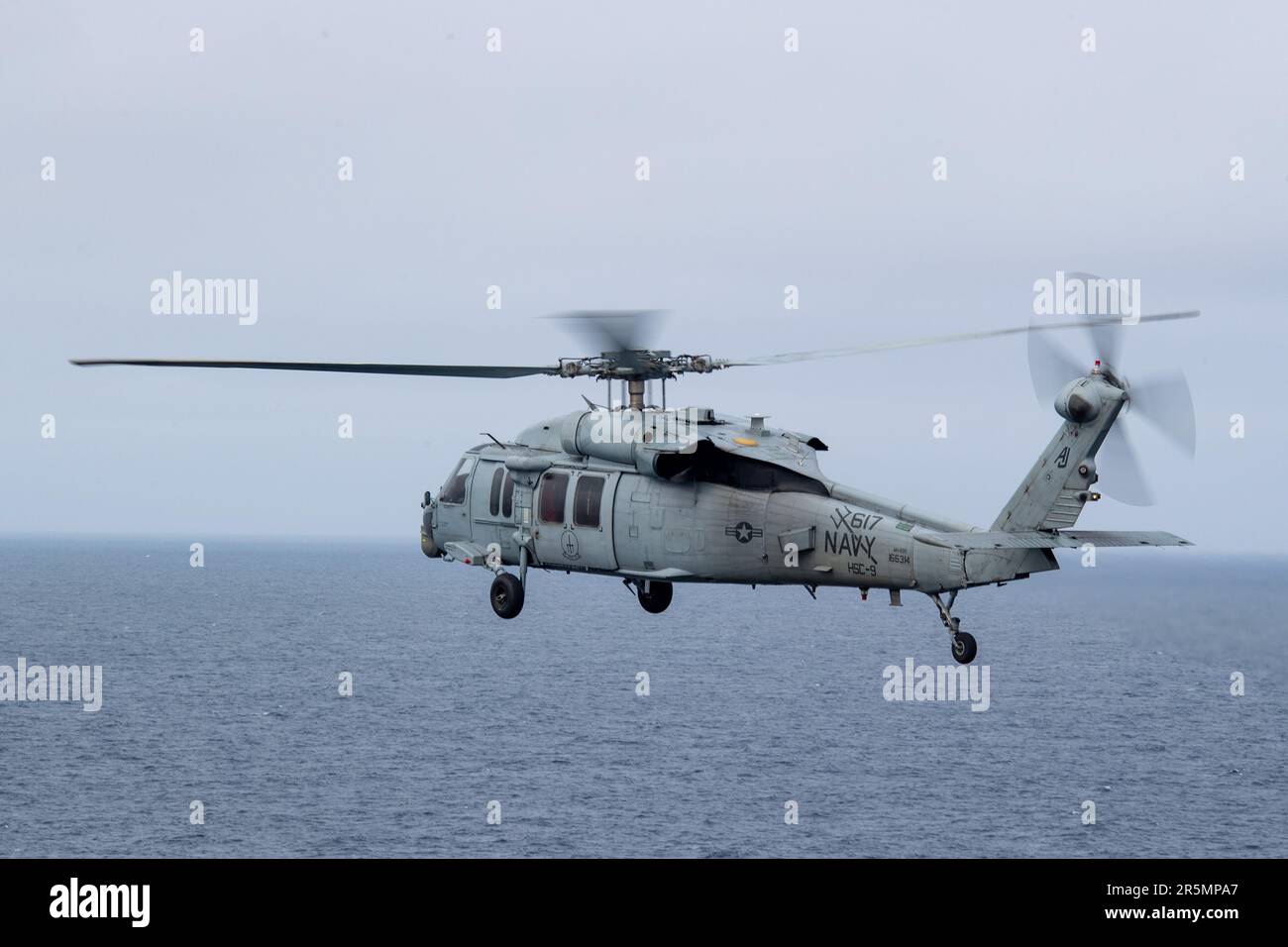 An MH-60S Sea Hawk attached to Helicopter Sea Combat Squadron (HSC) 9 ...