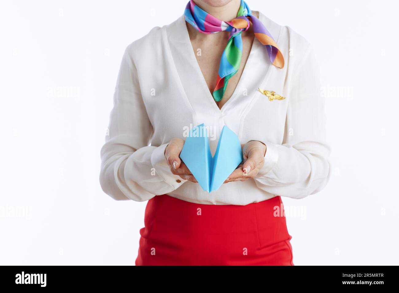 Closeup on stylish flight attendant woman isolated on white background ...