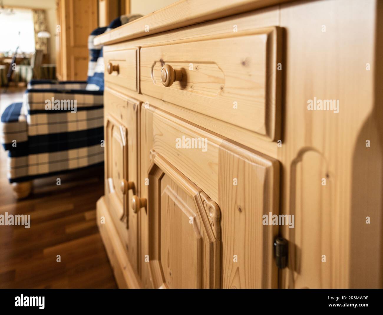 Wooden furniture made of pine in a private interior, made in the ...