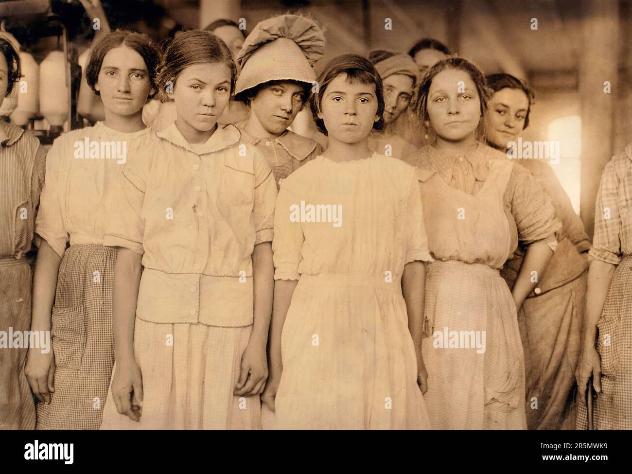 Group of young girls working in cotton mill, West, Texas, USA, Lewis ...