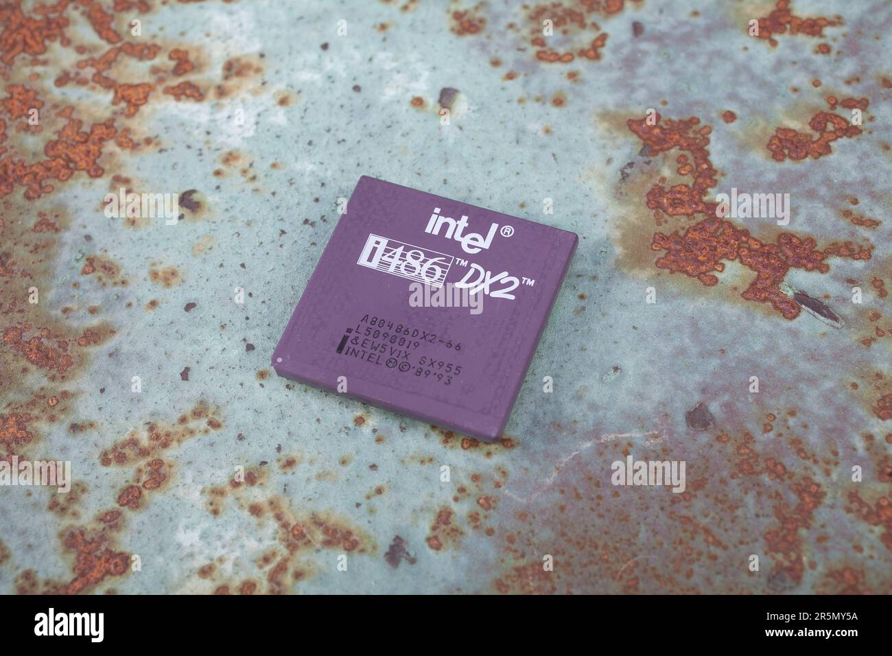 KYIV, UKRAINE - April 22, 2020. Intel 486SX processor on rusty metal ...