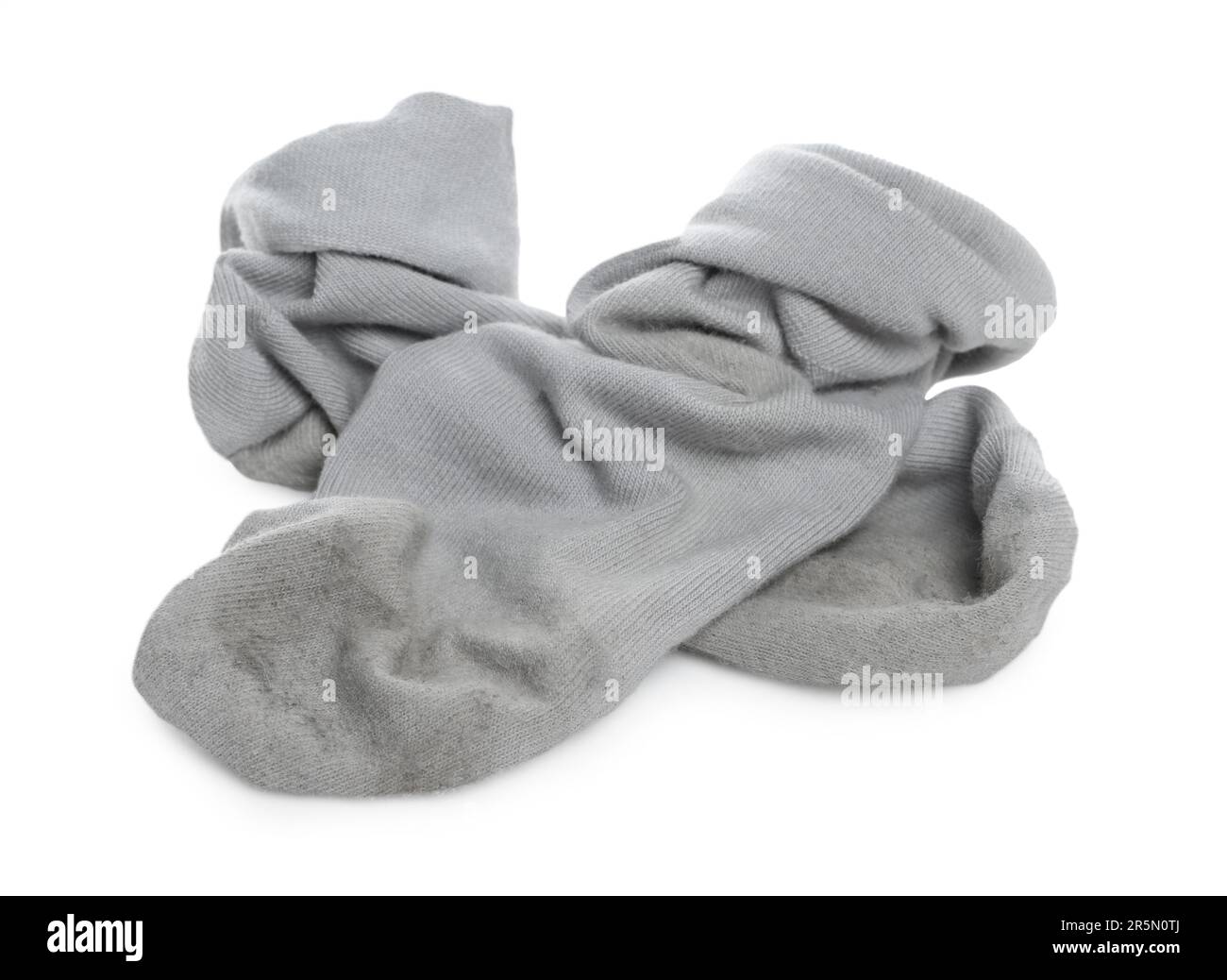 Pair of dirty socks on white background Stock Photo - Alamy