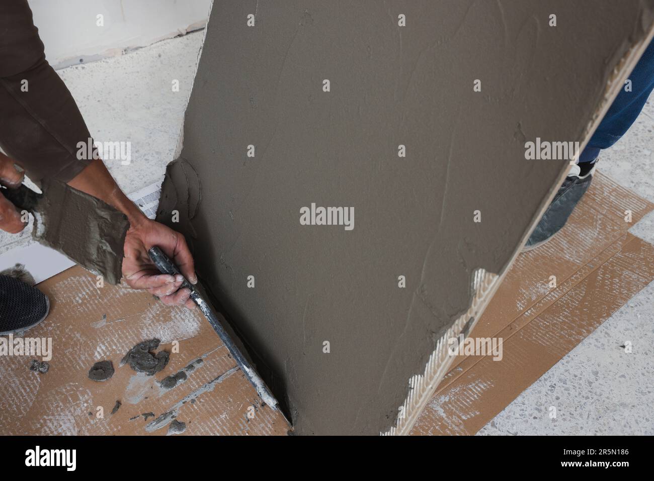 Applying tile hi-res stock photography and images - Alamy