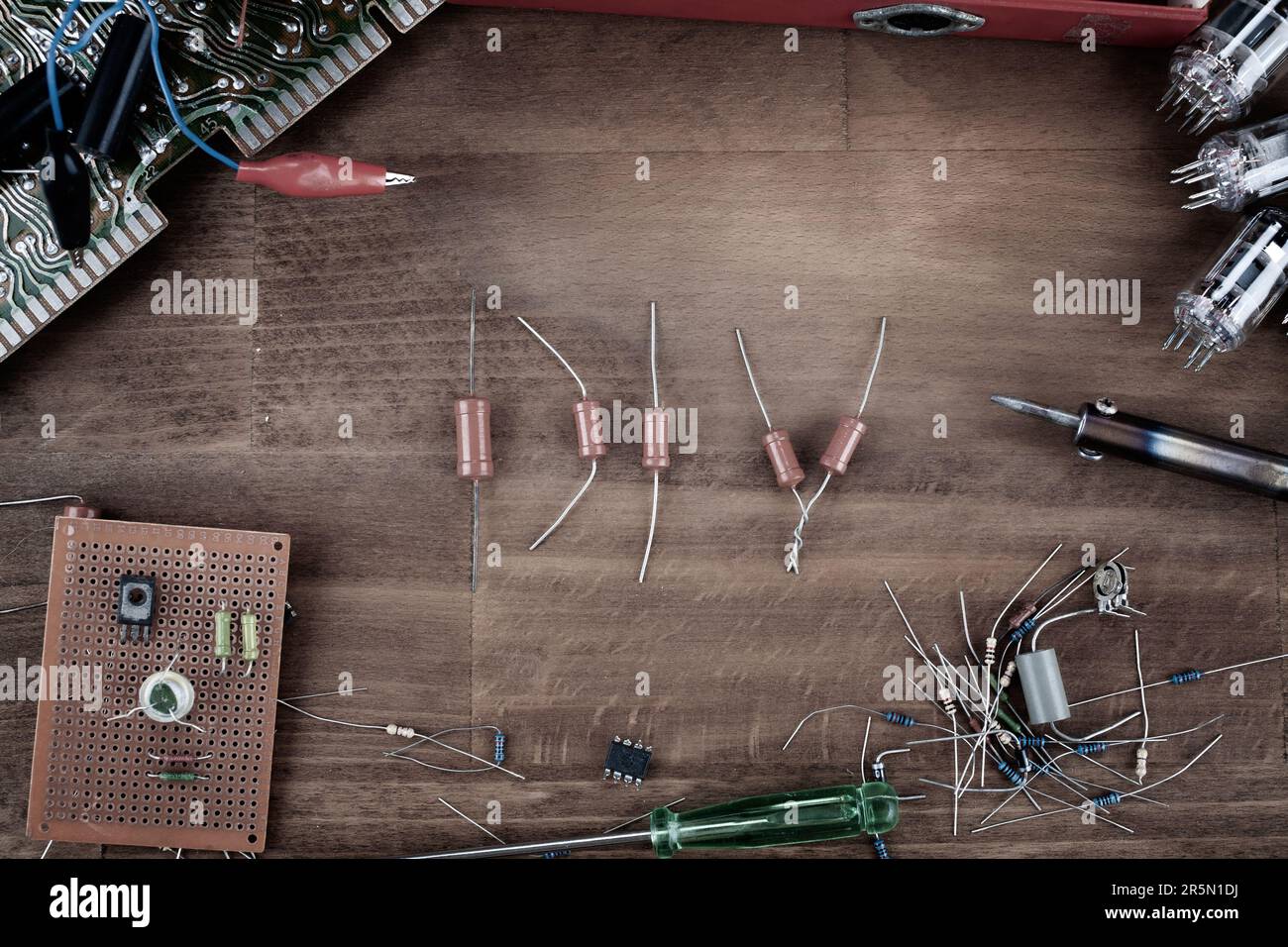 DIY. Do it yourself. Workplace with soldering iron, tools and ...