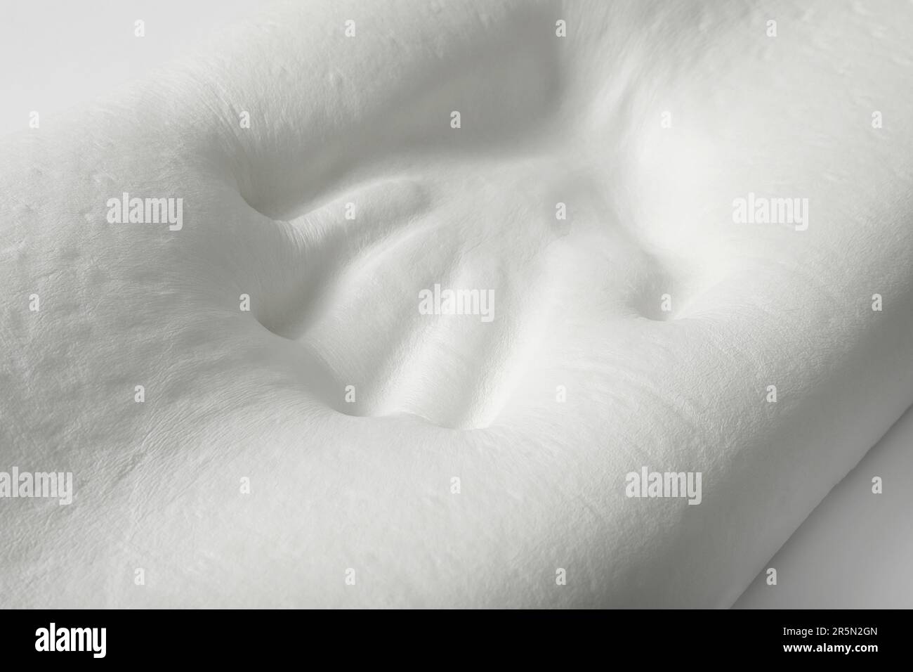 Memory foam pillow with handprint on white background, closeup Stock ...