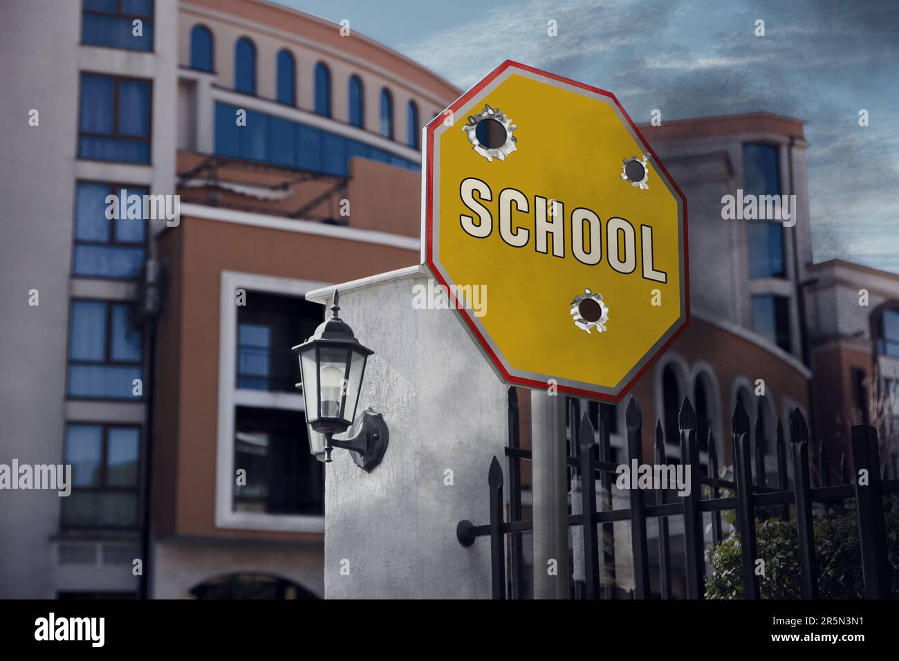 School sign damaged with shooting near building Stock Photo - Alamy