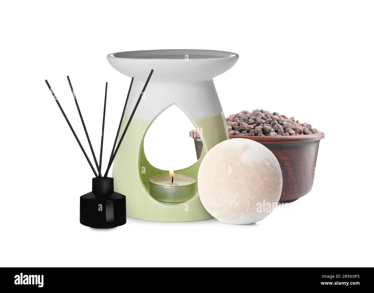 Beautiful composition with aroma lamp, reed diffuser and bowl of salt ...