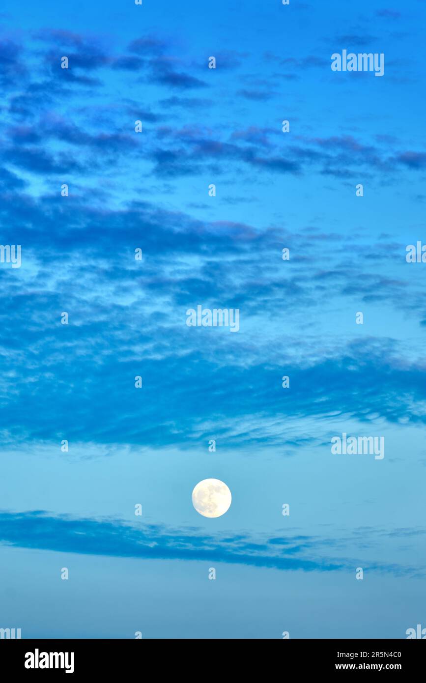 Dusk with full moon hi-res stock photography and images - Alamy