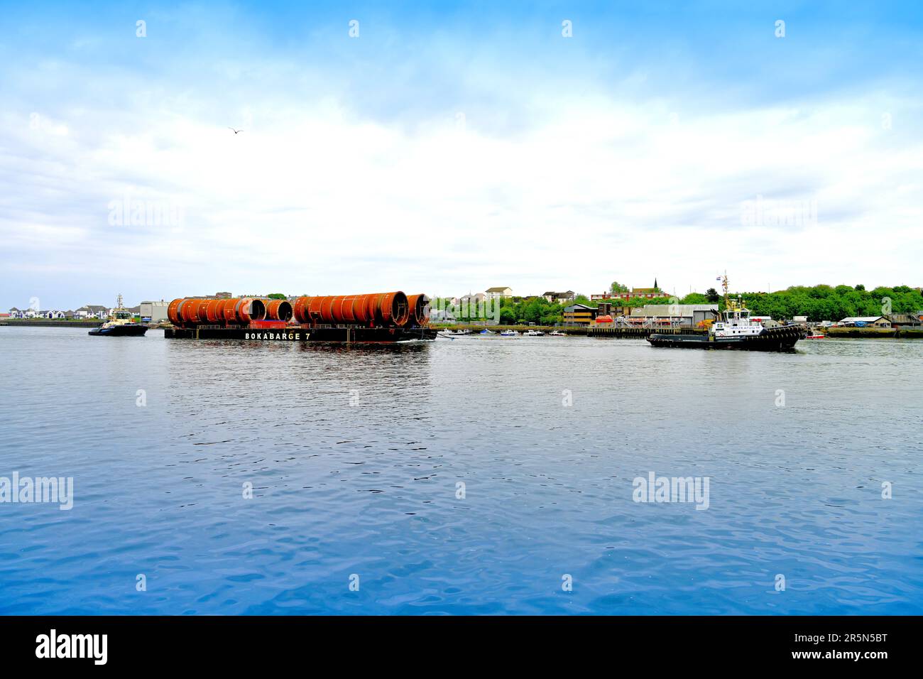 Tugs delivering massive steel piping to Smulders Howdon Tyne yard works ...