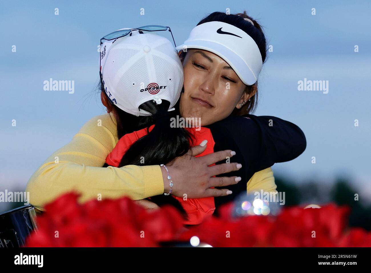 Michelle Wie West, right, hugs Rose Zhang after Zhang won the Mizuho ...
