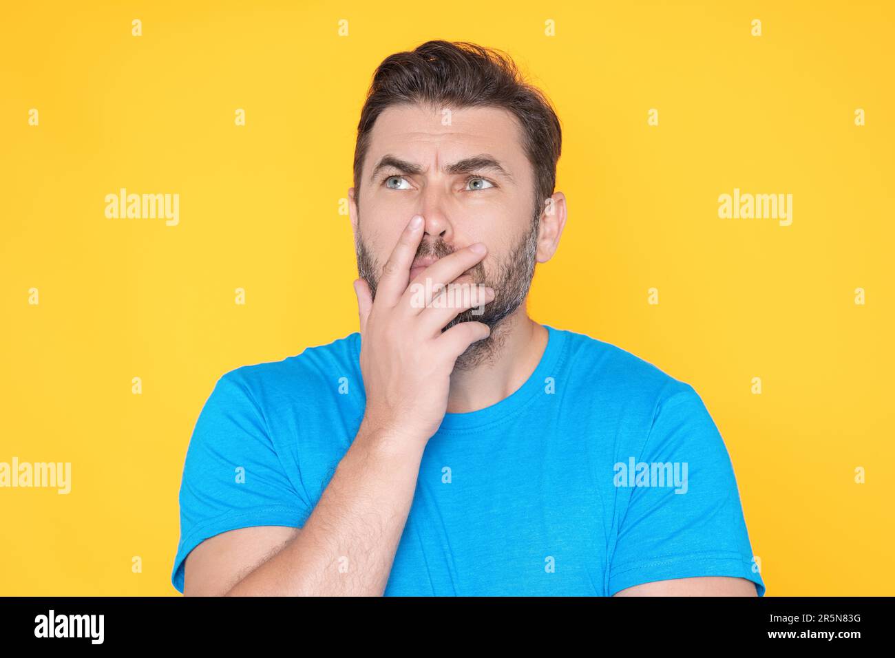 Man with confuse face expression having doubts. Thoughtful man ...