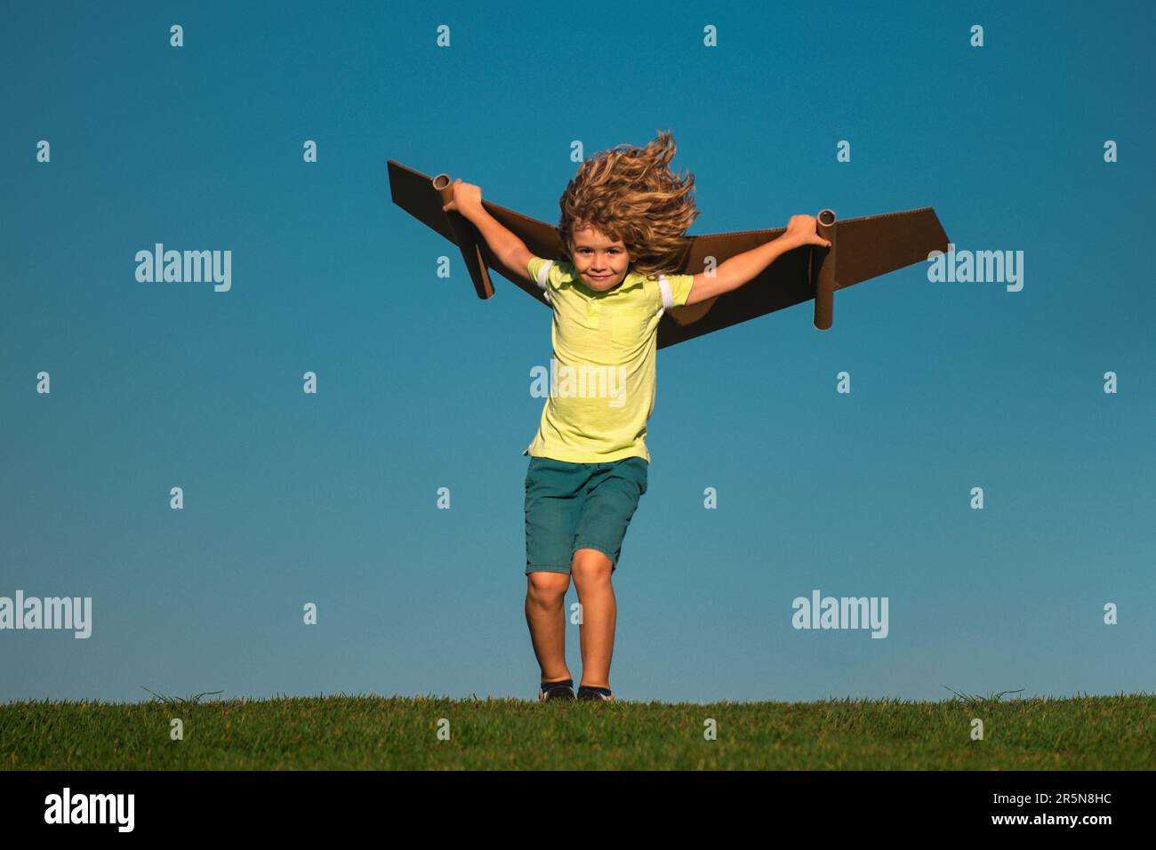 Freedom kids, boy playing to be airplane pilot. Kid dreams of future ...