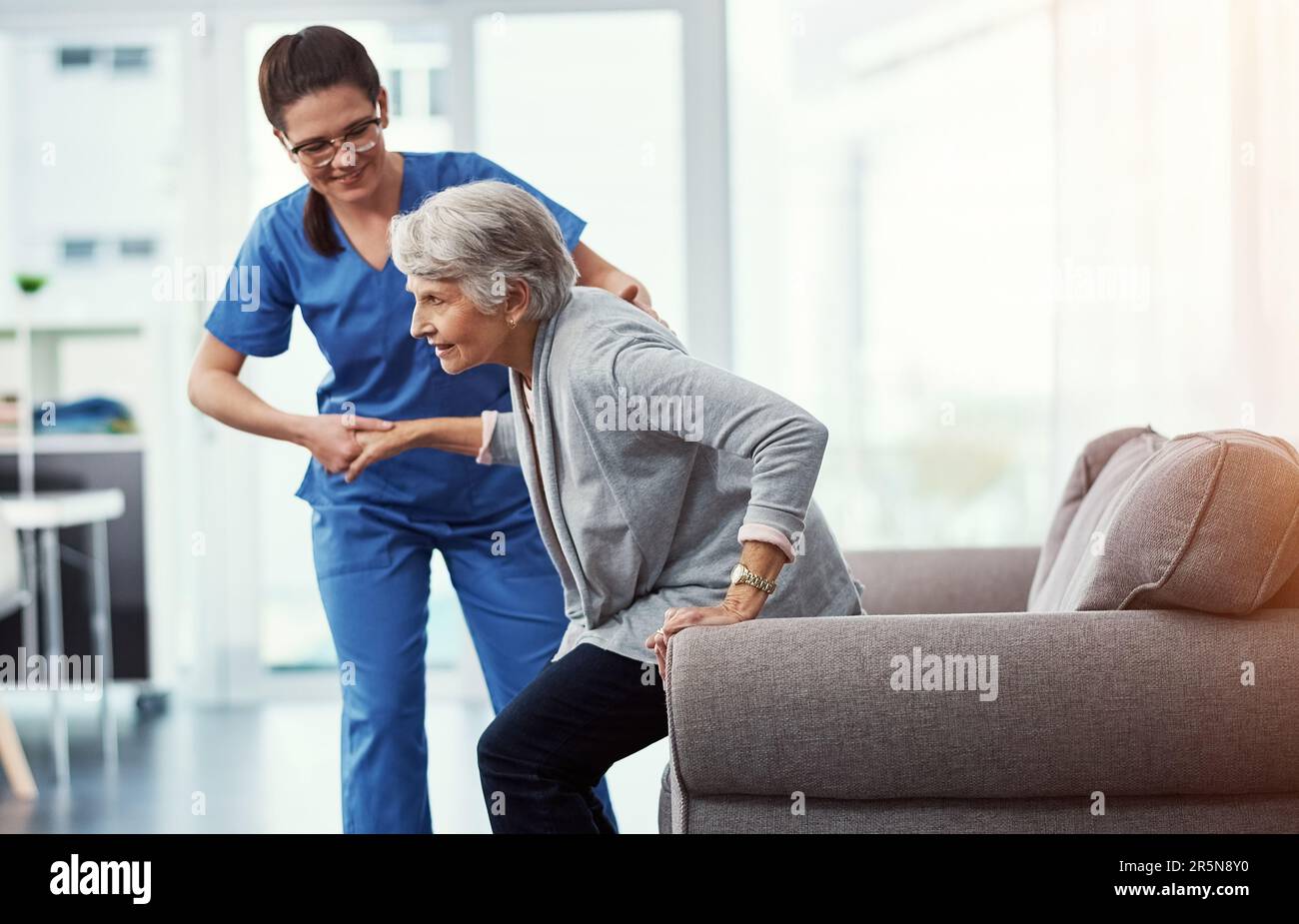 Helping from a chair old person hi-res stock photography and images - Alamy