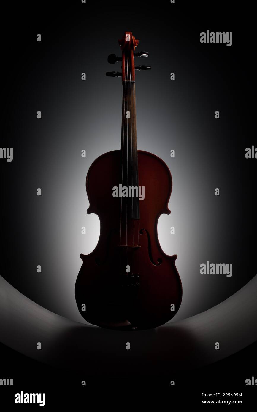 Violin on black background Stock Photo - Alamy