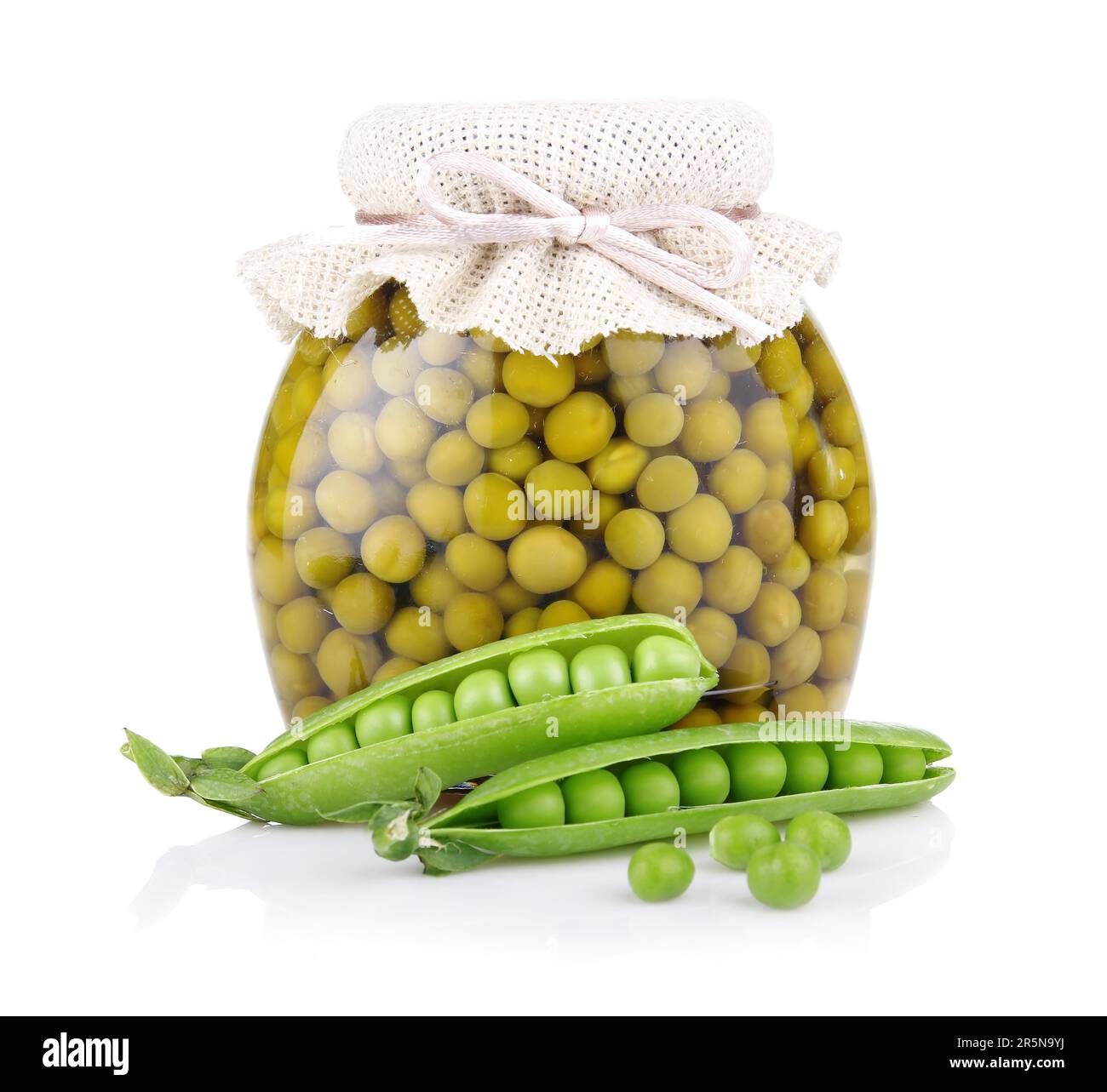 Jar of green pea with fresh pods isolated on white background Stock ...