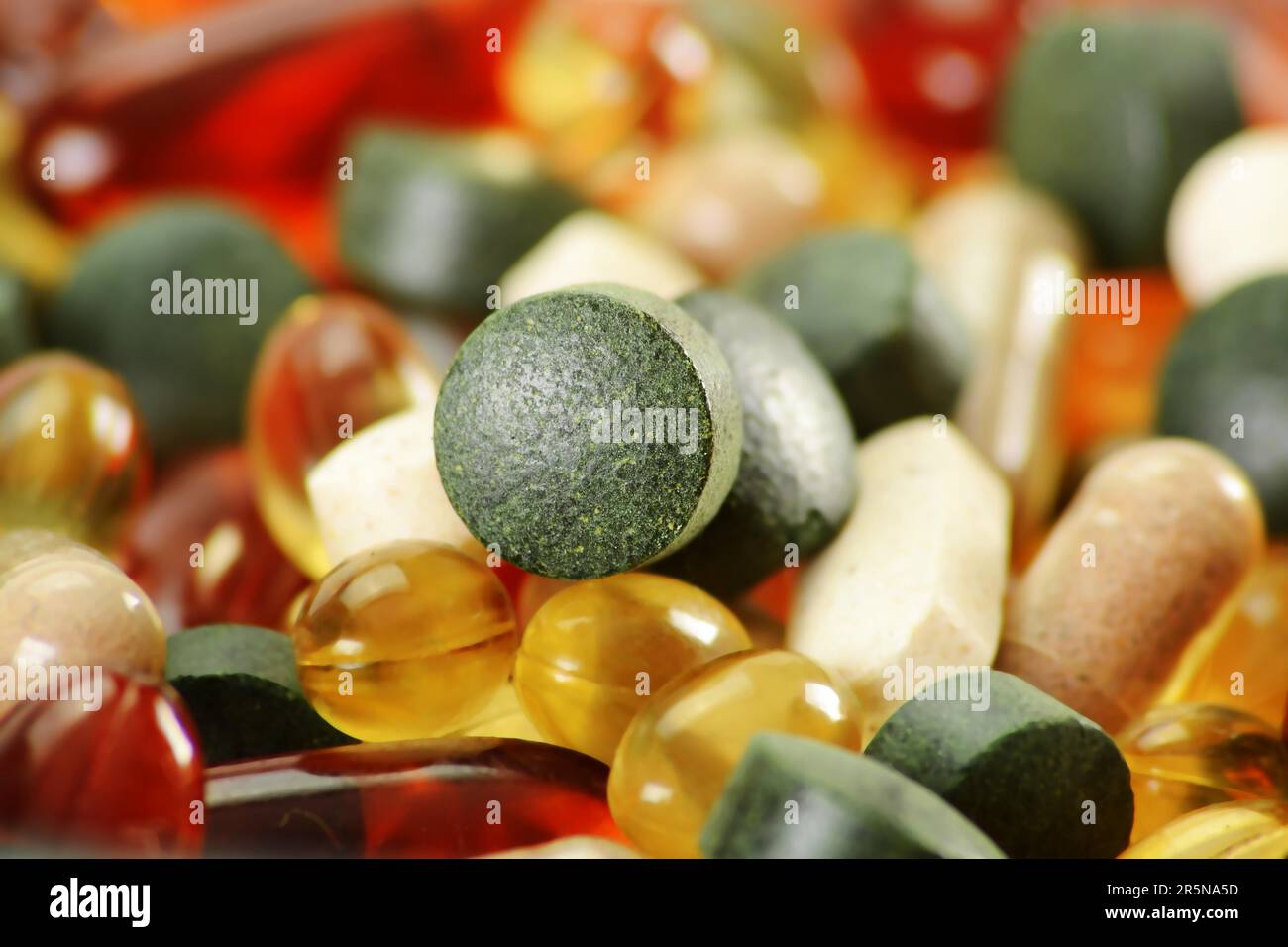 Composition with dietary supplement capsules and tablets Stock Photo ...